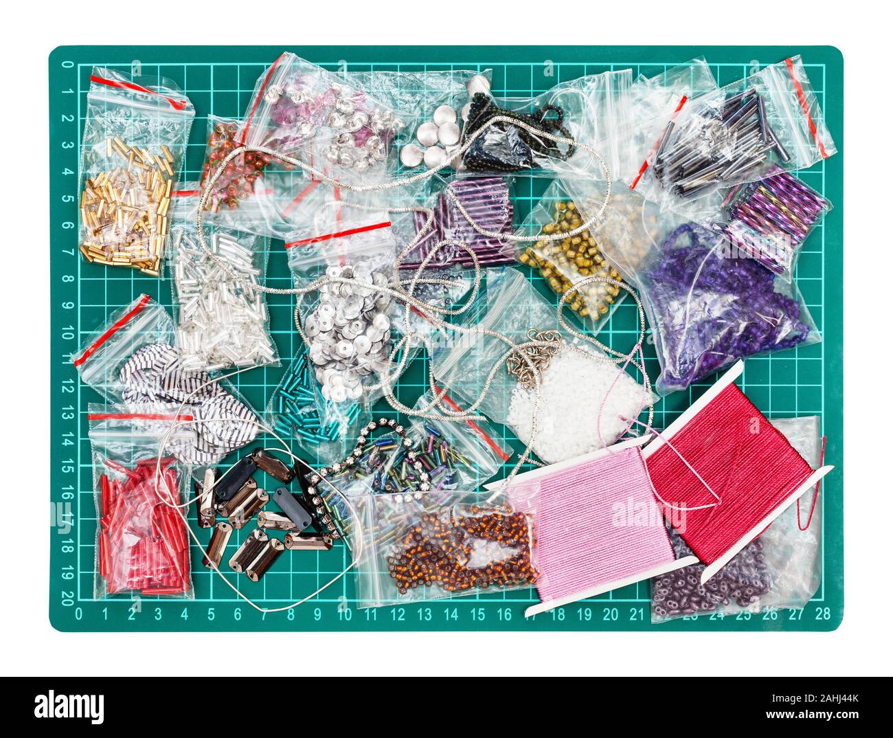 needlecraft background - top view of various items, beads, bugles ...