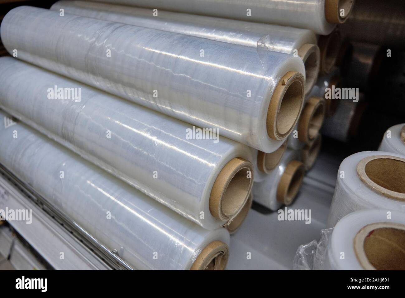 Rolled stretch palletizer tape at warehouse counter Stock Photo - Alamy