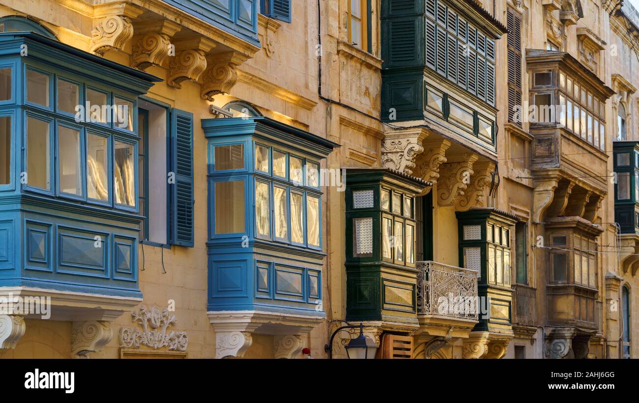 Typical Maltese covered balconies in Valletta Stock Photo - Alamy