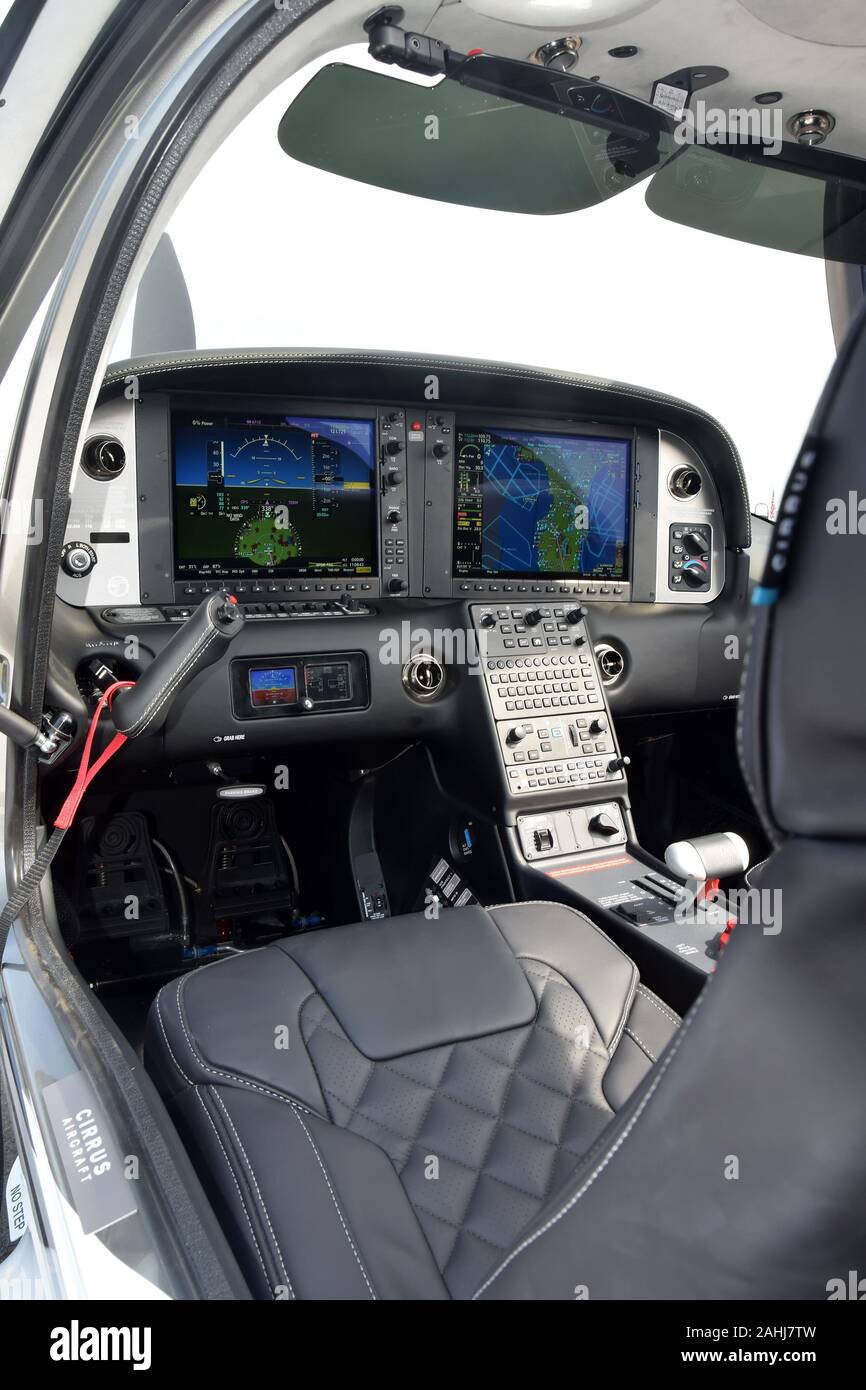 Cockpit of expensive high tech modern propeller driven airplane. Full ...