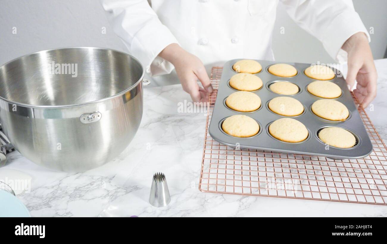 Step by step. Cooling freshly baked vanilla cupcakes on wire cooling ...