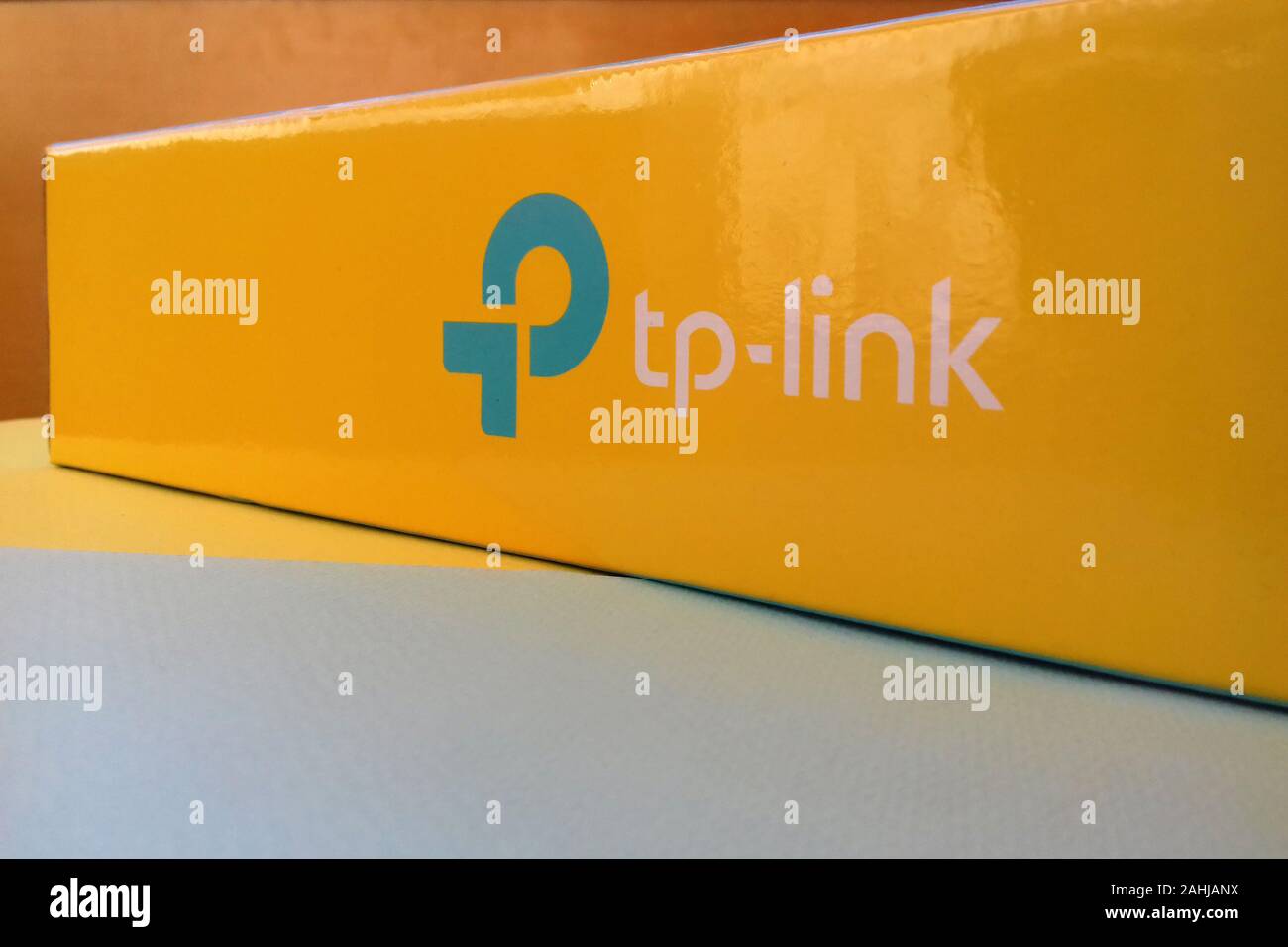 NY, USA - NOVEMBER 24, 2019: Yellow box of Wireless router modem tp ...