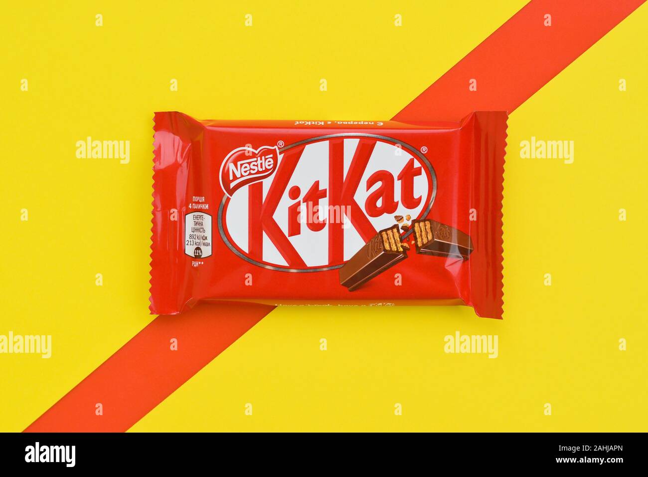 NY, USA - DECEMBER 4, 2019: Kit Kat chocolate bars in red wrapping lies ...
