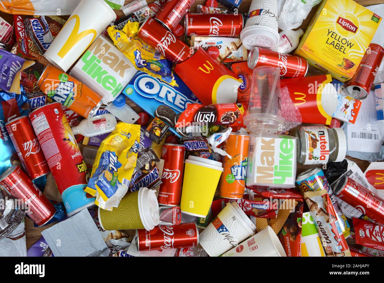 NY, USA - DECEMBER 25, 2019: Big pile of many disposable colored trash ...