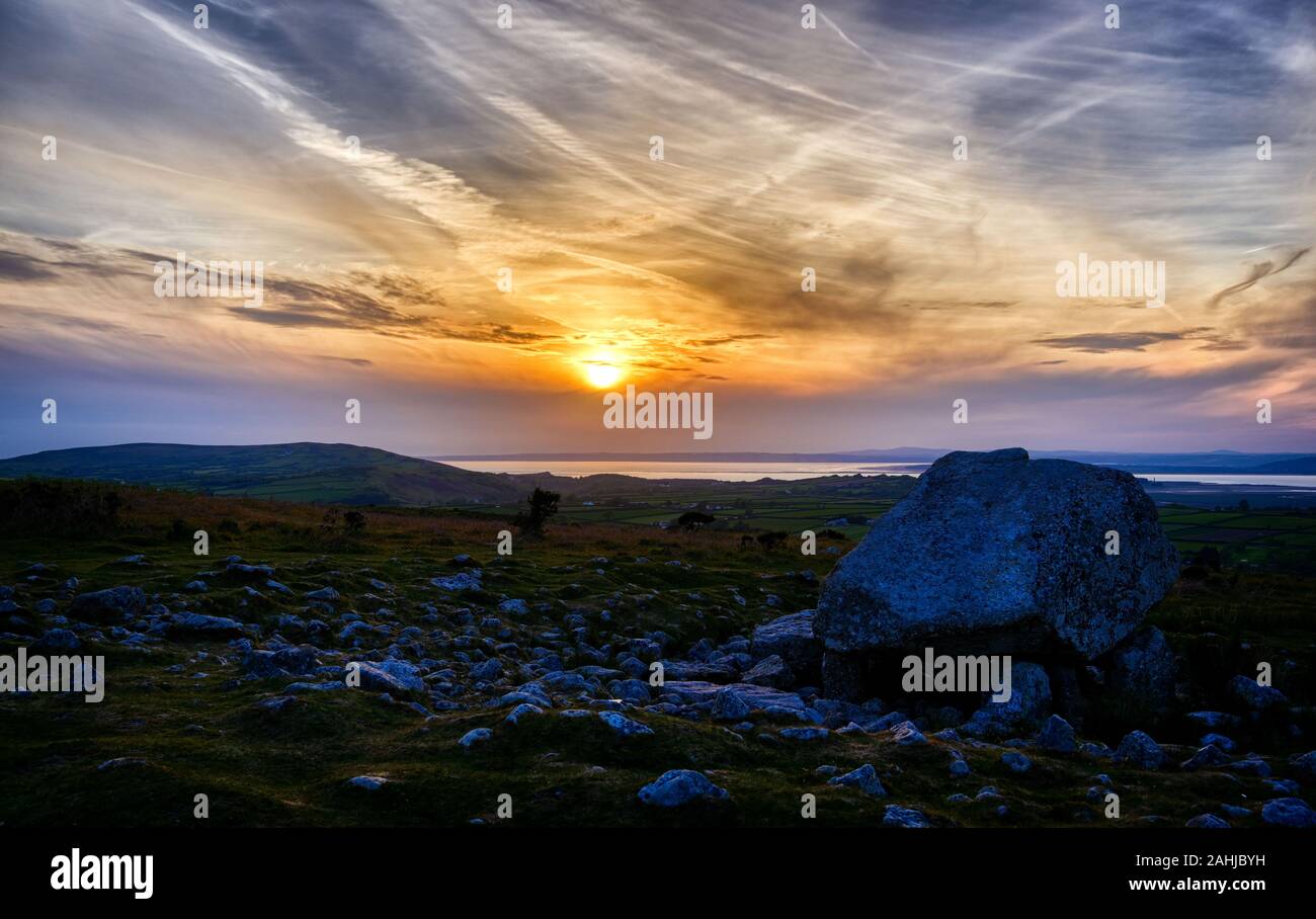 Sunset over Arthur's stone on the Gower peninsular Stock Photo - Alamy