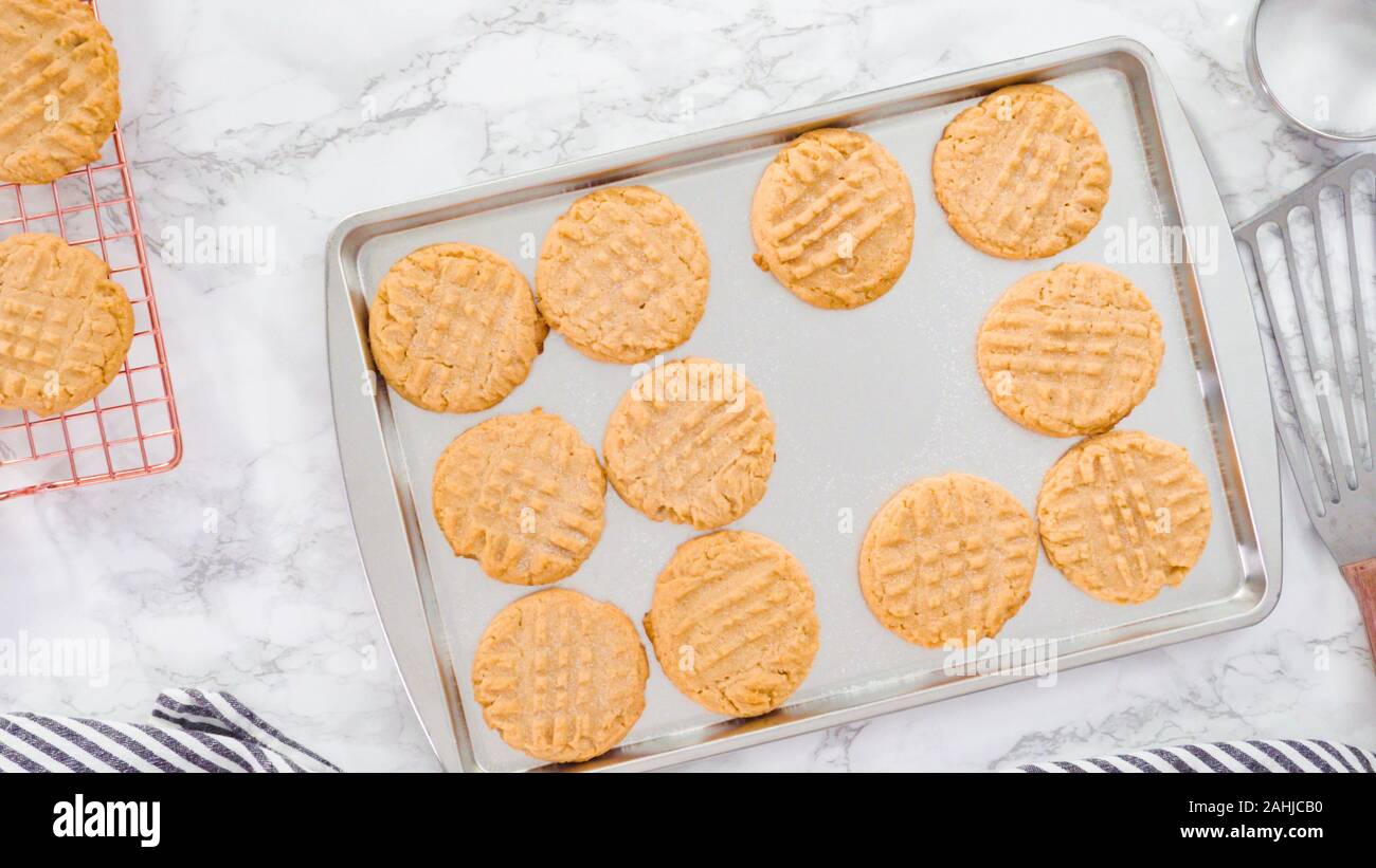 Flat lay. Step by step. Freshly baked peanut butter cookies on baking ...