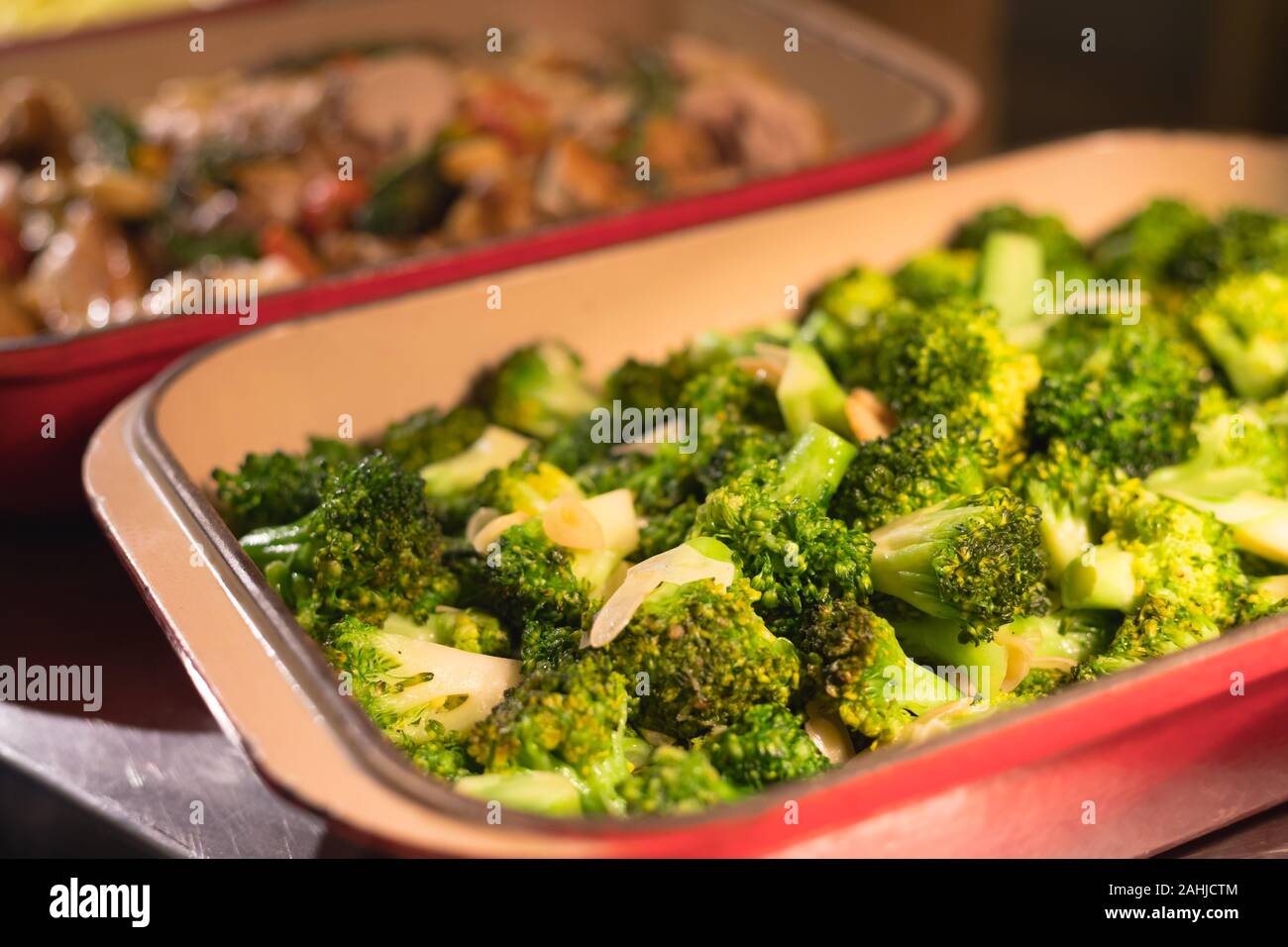 closeup broccoli in a tray for buffet in hotel Stock Photo - Alamy