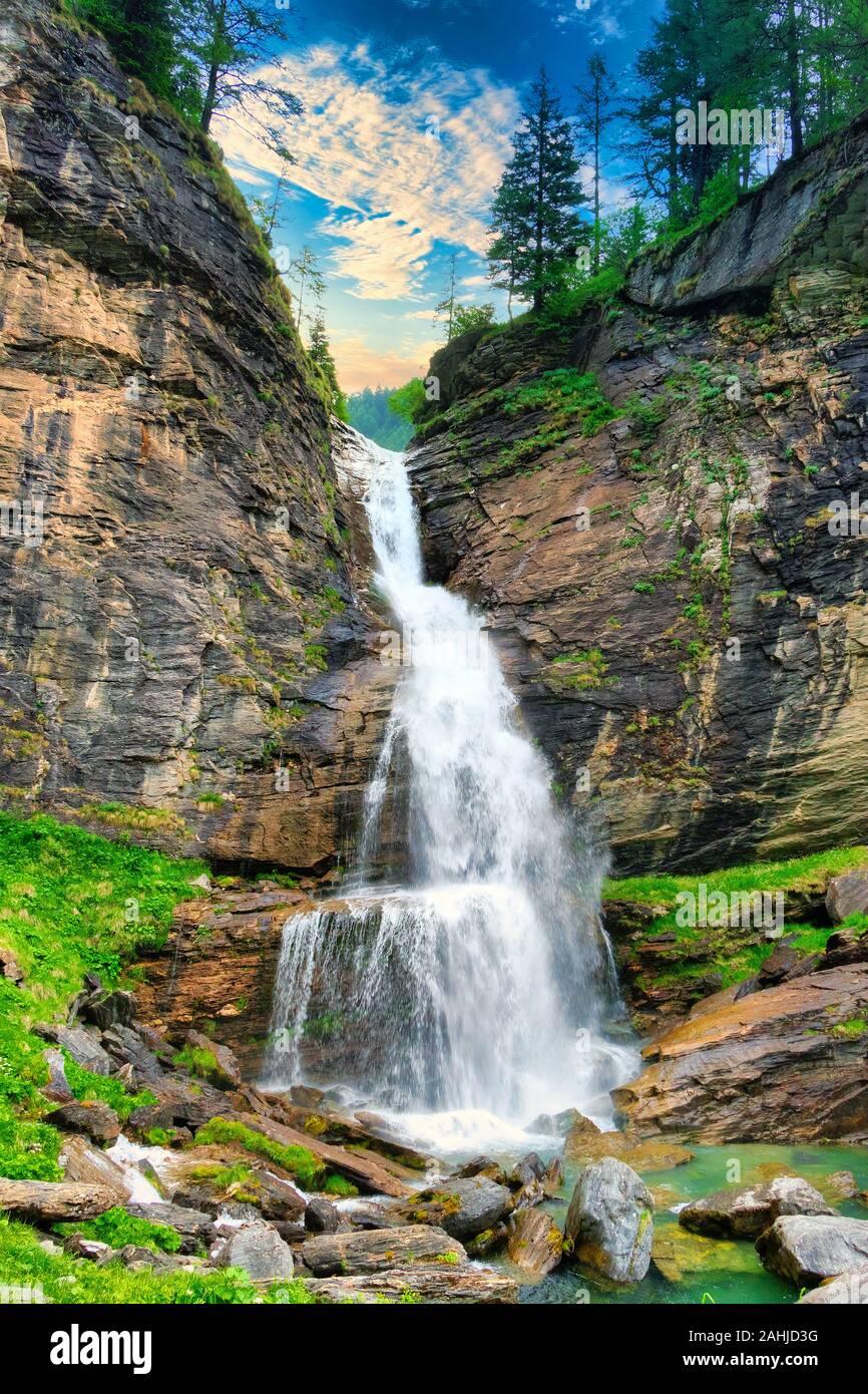 Small waterfall between the rocks Stock Photo - Alamy