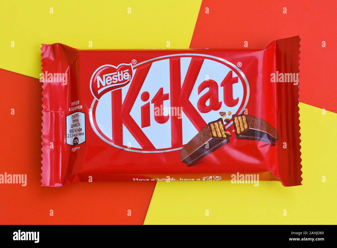 NY, USA - DECEMBER 4, 2019: Kit Kat chocolate bars in red wrapping lies ...