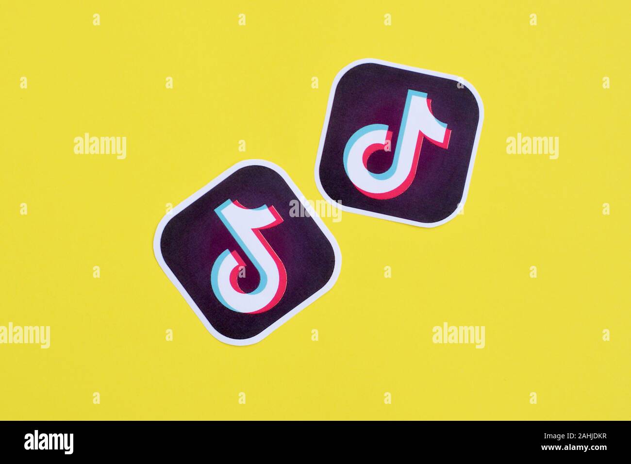 NY, USA - DECEMBER 5, 2019: Tiktok paper logo on yellow background ... NY, USA - DECEMBER 5, 2019: Tiktok paper logo on yellow background ...