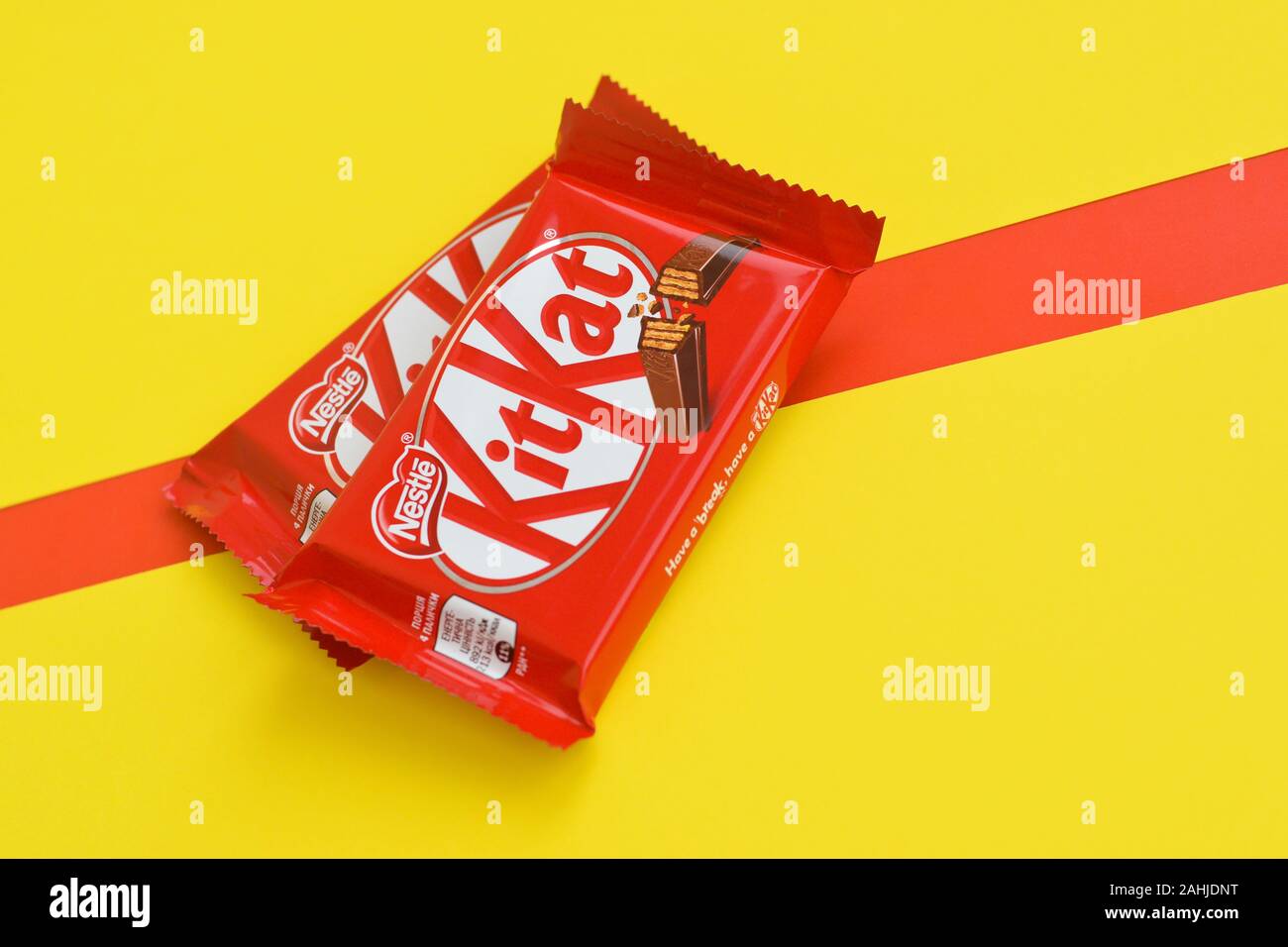 NY, USA - DECEMBER 4, 2019: Kit Kat chocolate bars in red wrapping lies ...
