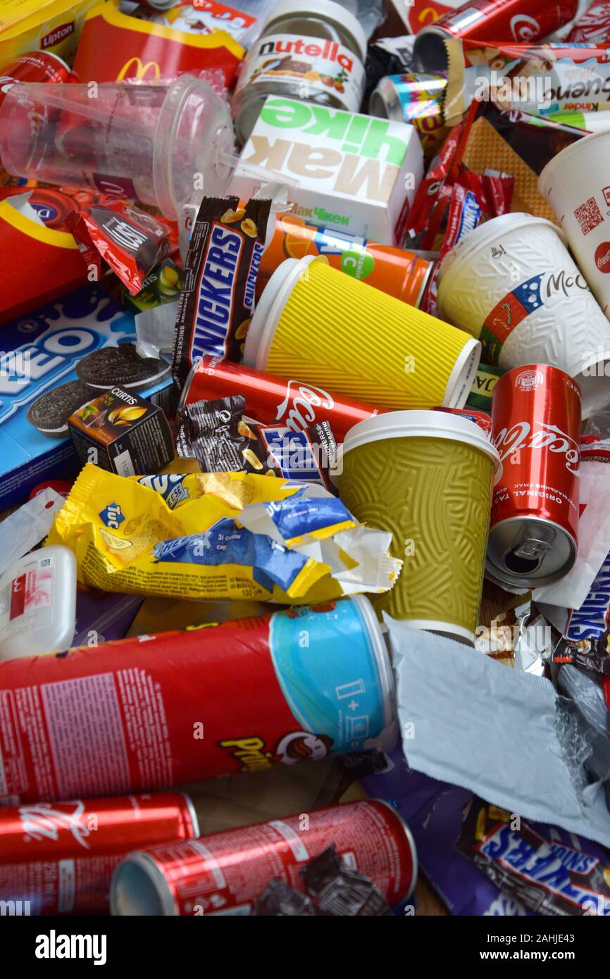 NY, USA - DECEMBER 25, 2019: Big pile of many disposable colored trash ...