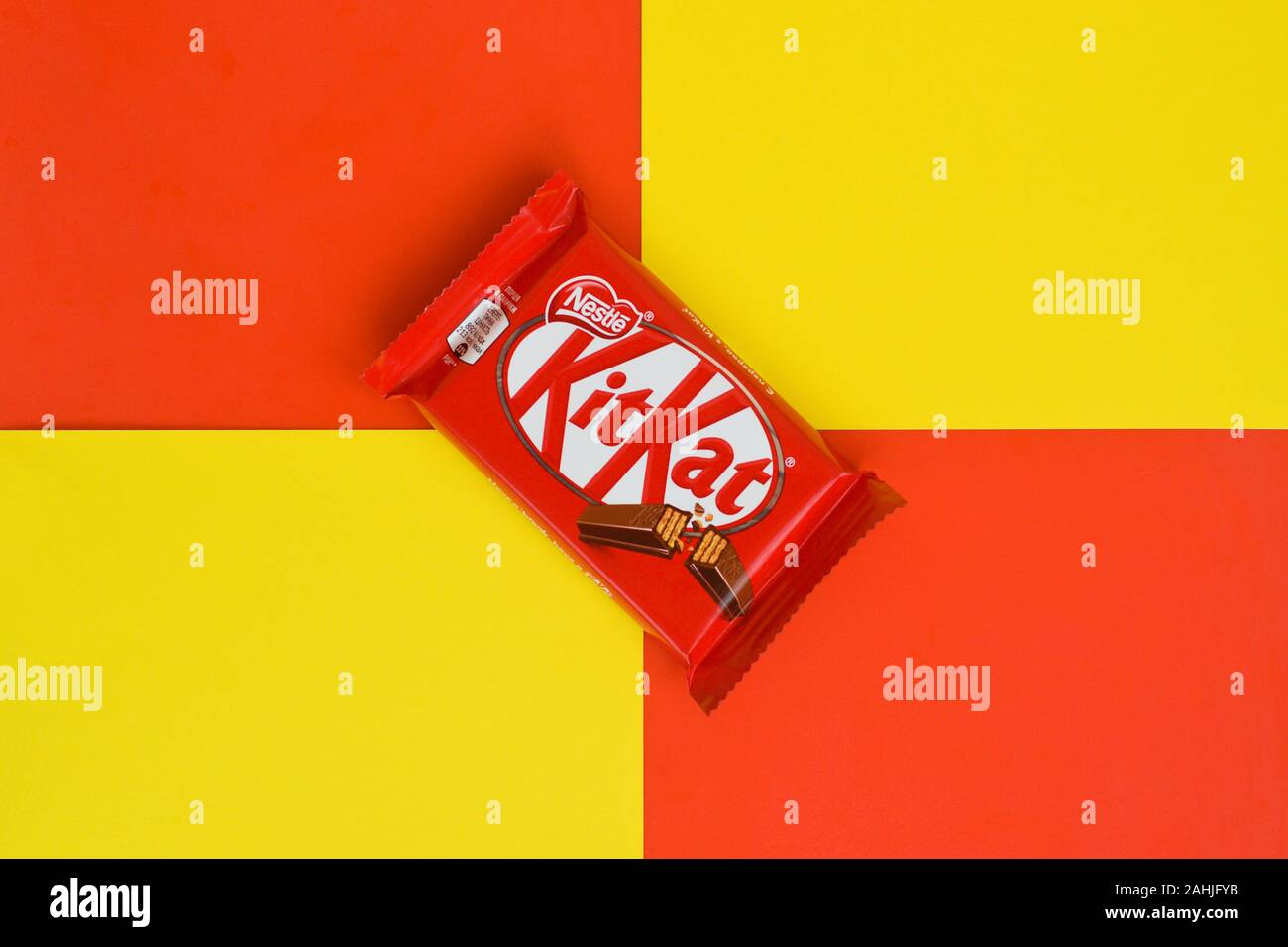 NY, USA - DECEMBER 4, 2019: Kit Kat chocolate bars in red wrapping lies ...