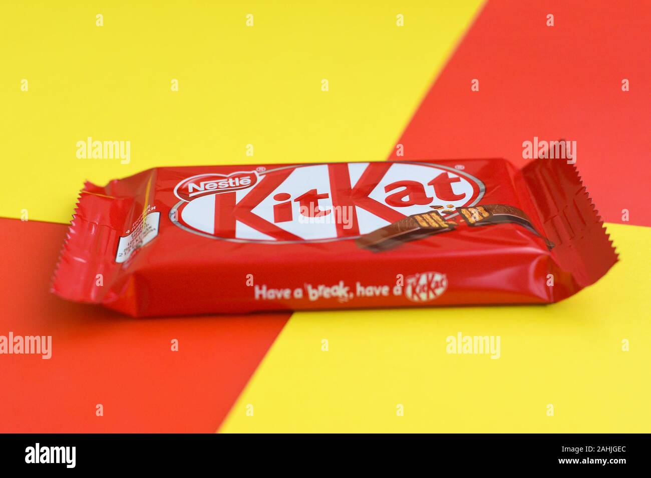 NY, USA - DECEMBER 4, 2019: Kit Kat chocolate bars in red wrapping lies ...