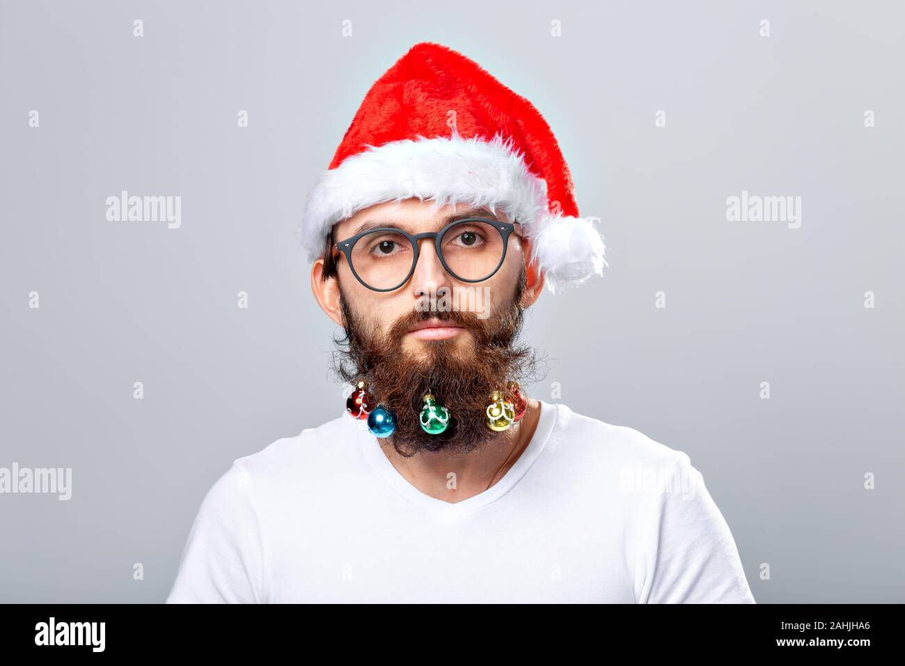 Christmas, holidays, barbershop and style concept - young handsome ...
