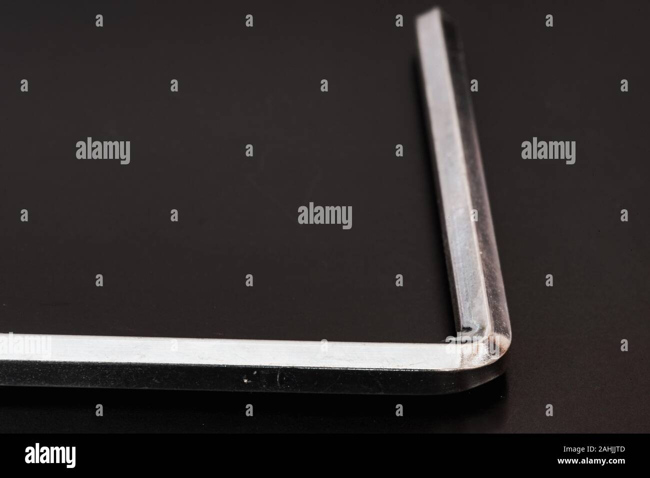 hexagon socket screw allen key in a solid background Stock Photo - Alamy