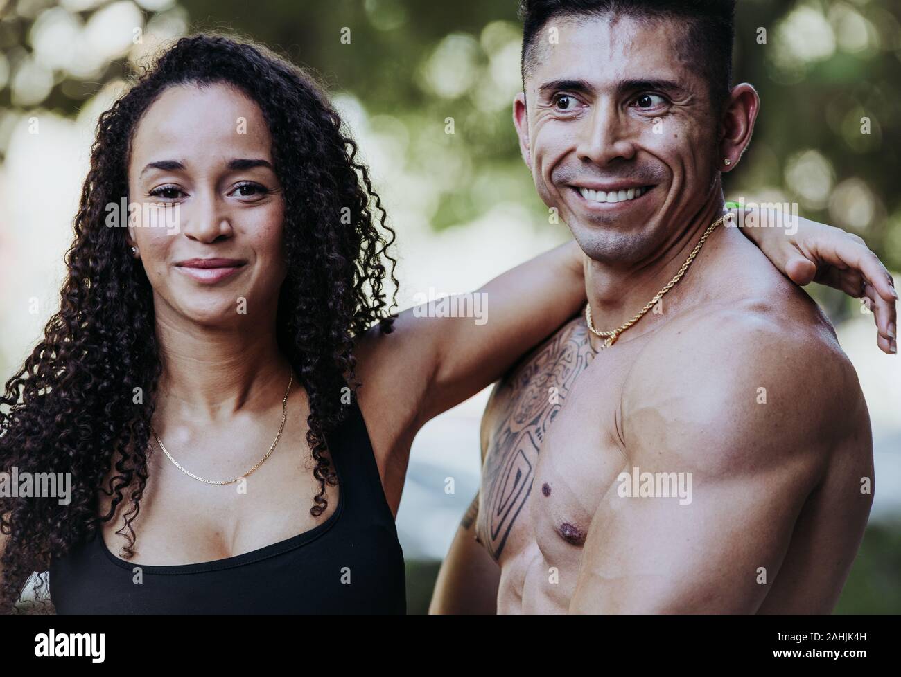 Stock photo of a Vertical photo of a young couple of different ...