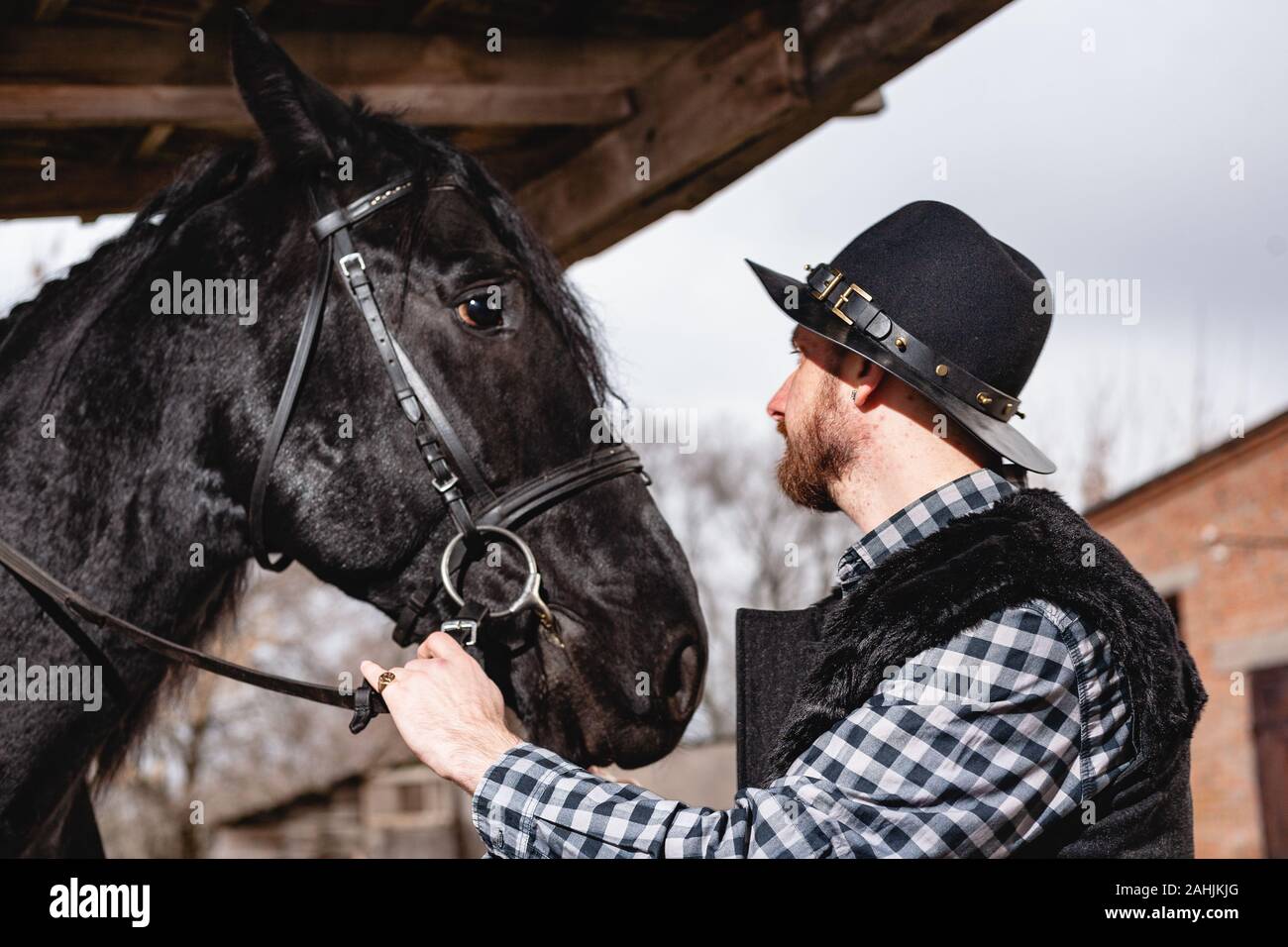 Man Standing Next Horse High Resolution Stock Photography and Images ...