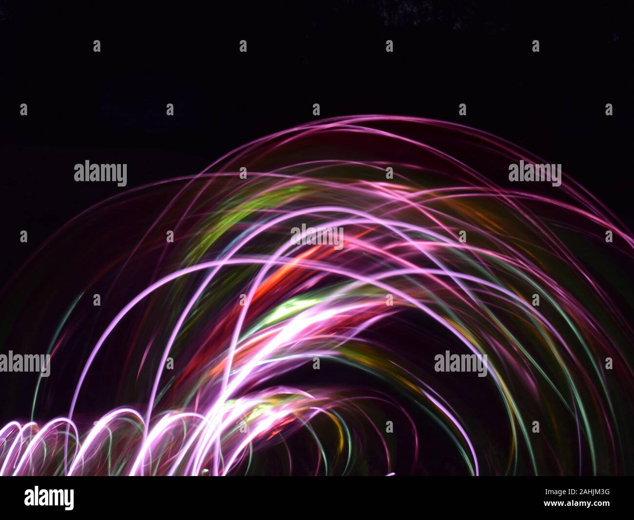 long exposure, curves and waves against a black background Stock Photo ...