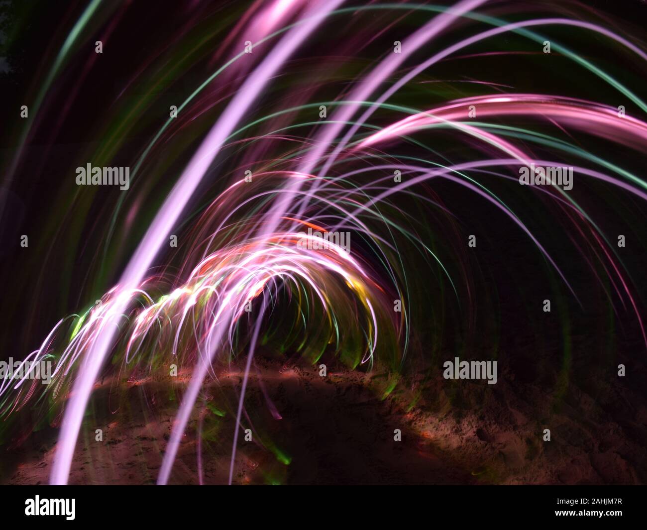 long exposure, curves and waves against a black background Stock Photo ...