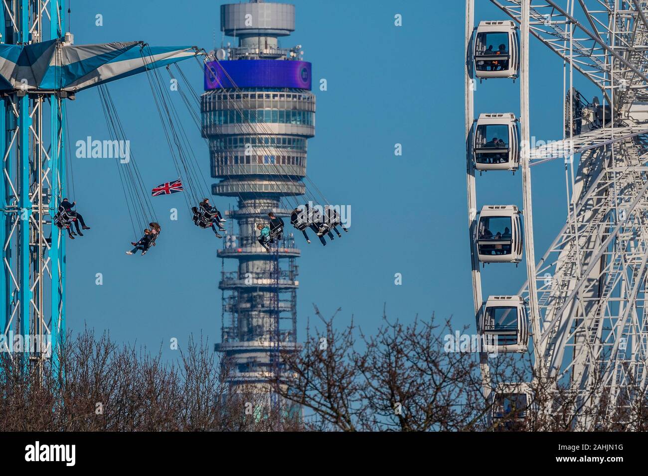 Visitors enjoy the rides at winter wonderland in hyde park hi-res stock ...