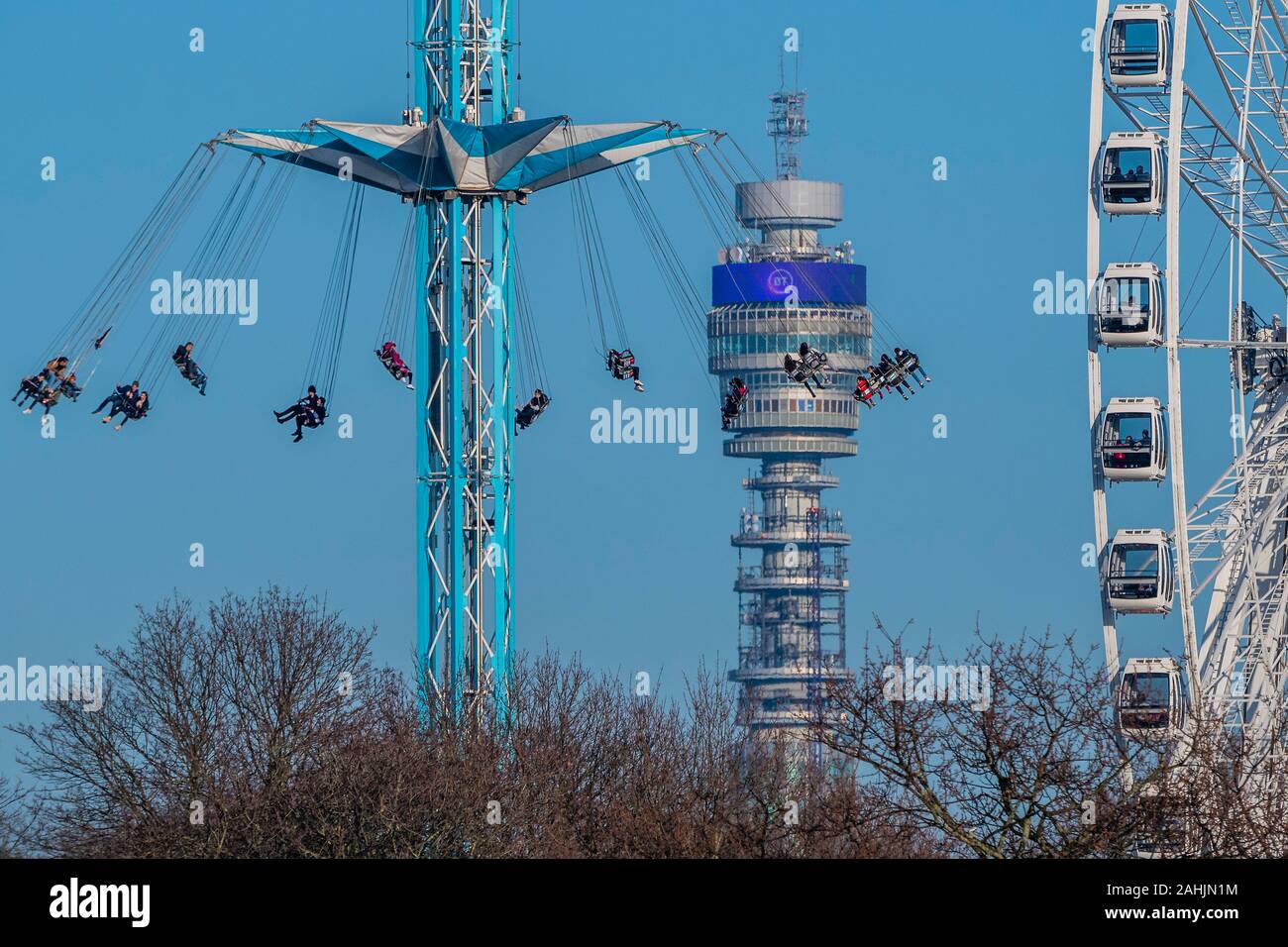 Visitors enjoy the rides at winter wonderland in hyde park hi-res stock ...