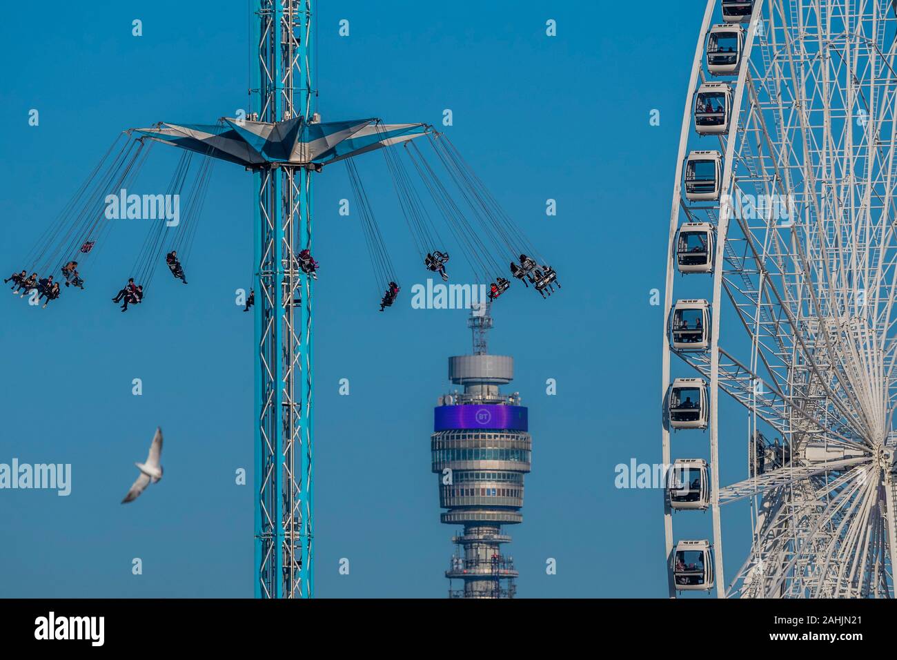 Tourists enjoy flying high on the rides in Winter Wonderland in Hyde ...