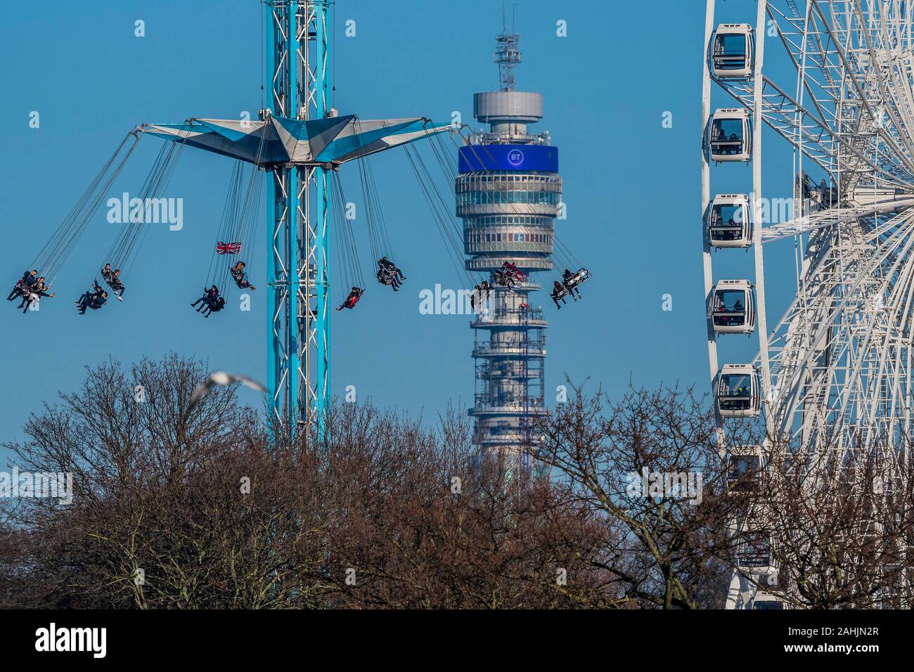 Tourists enjoy flying high on the rides in Winter Wonderland in Hyde ...