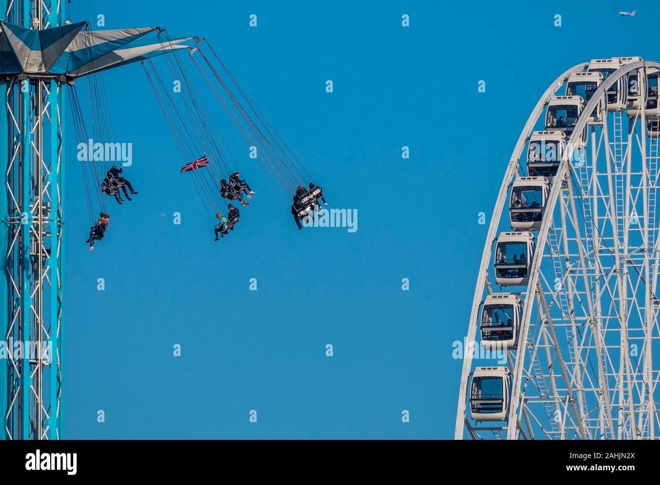 Tourists enjoy flying high on the rides in Winter Wonderland in Hyde ...