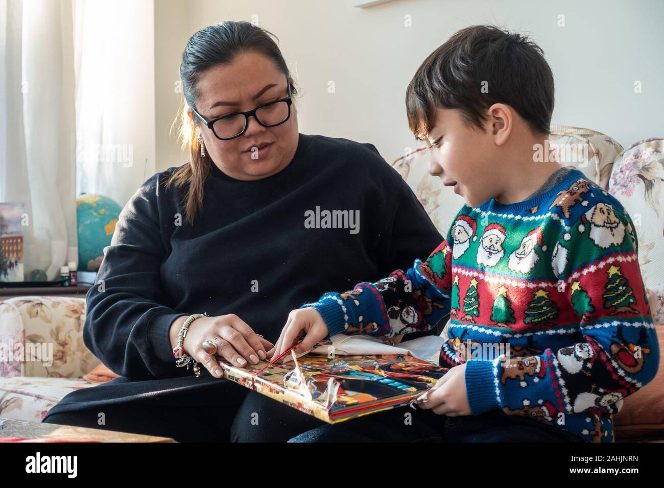 Boy receiving package hi-res stock photography and images - Alamy