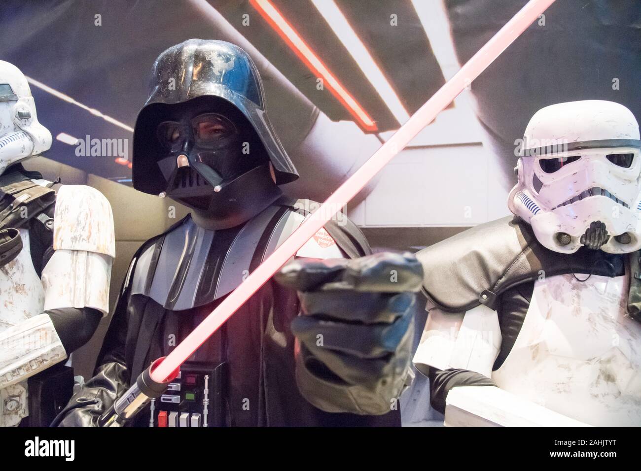 Star Wars fan dressed as Darth Vader and stormtroopers during a Star ...