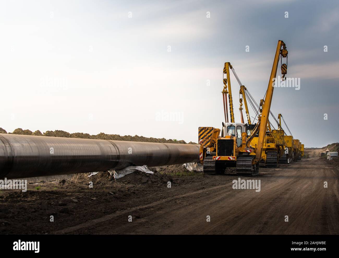 Construction of a new oil pipeline.Machine to twist pipes(pipelaying ...