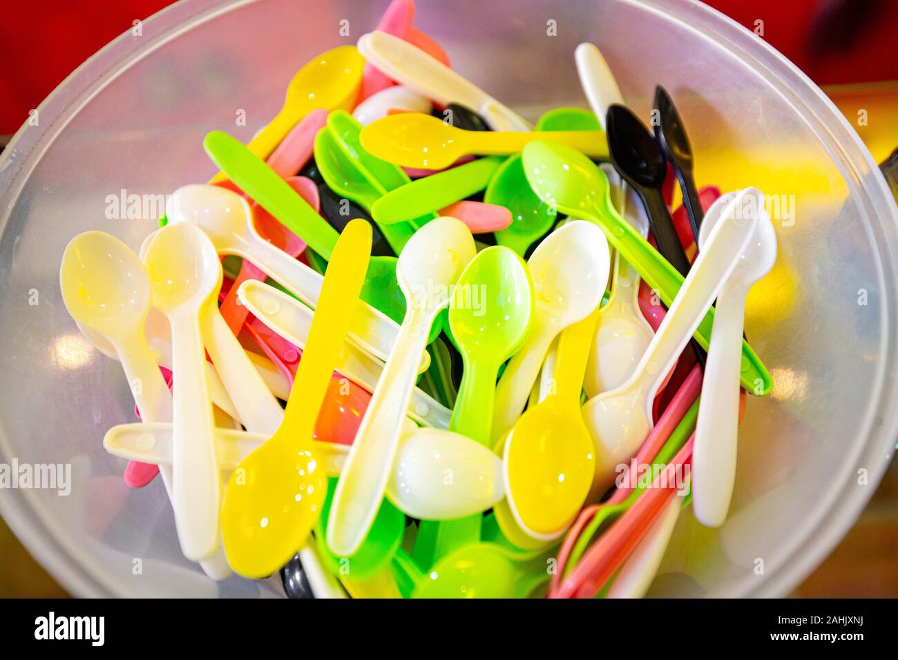 Colourful plastic spoons to recycle and stop pollution isolated Stock ...