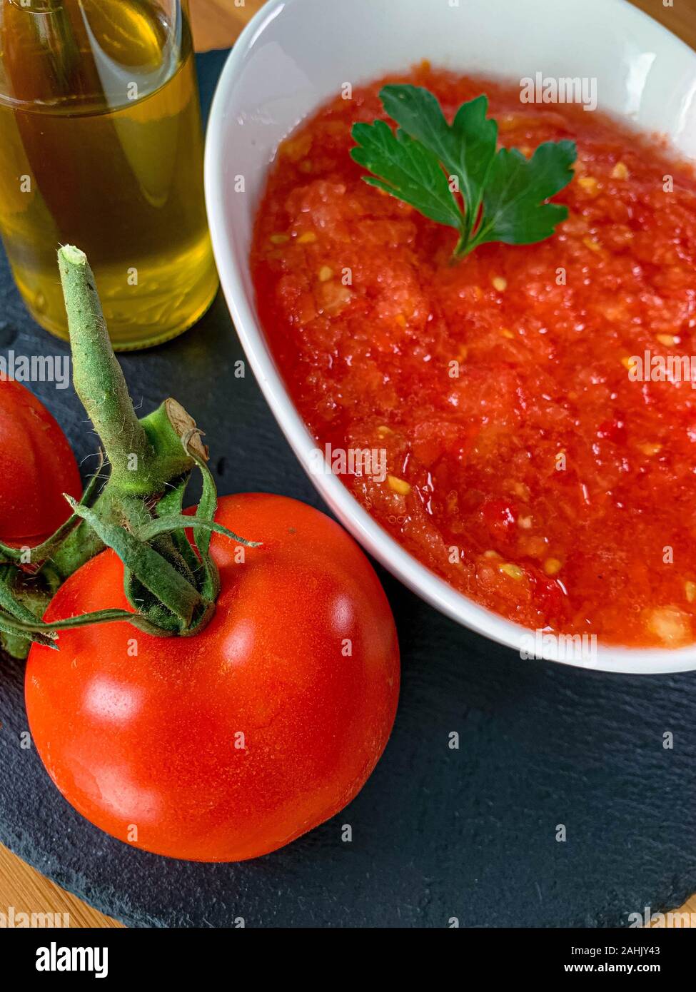 Homemade tomato paste in a white bowl , view from above Stock Photo - Alamy