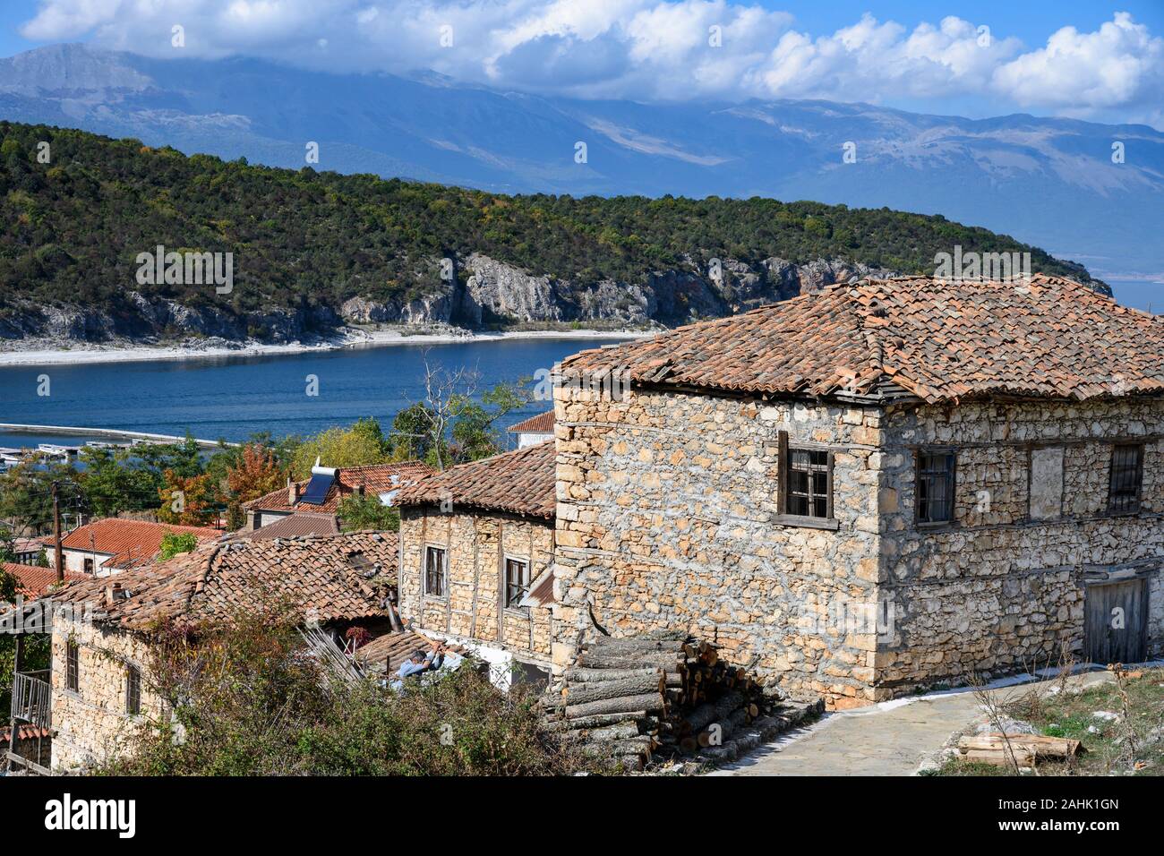 Old stone houses in the village of Psarades on Lake Prespa in Macedonia ...