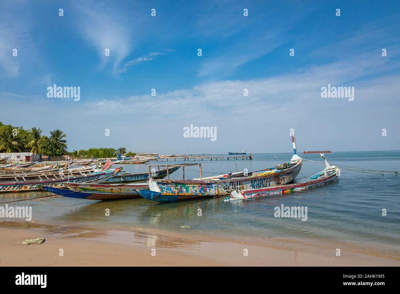 Traditional painted wooden fishing boat in Djiffer, Senegal. West ...