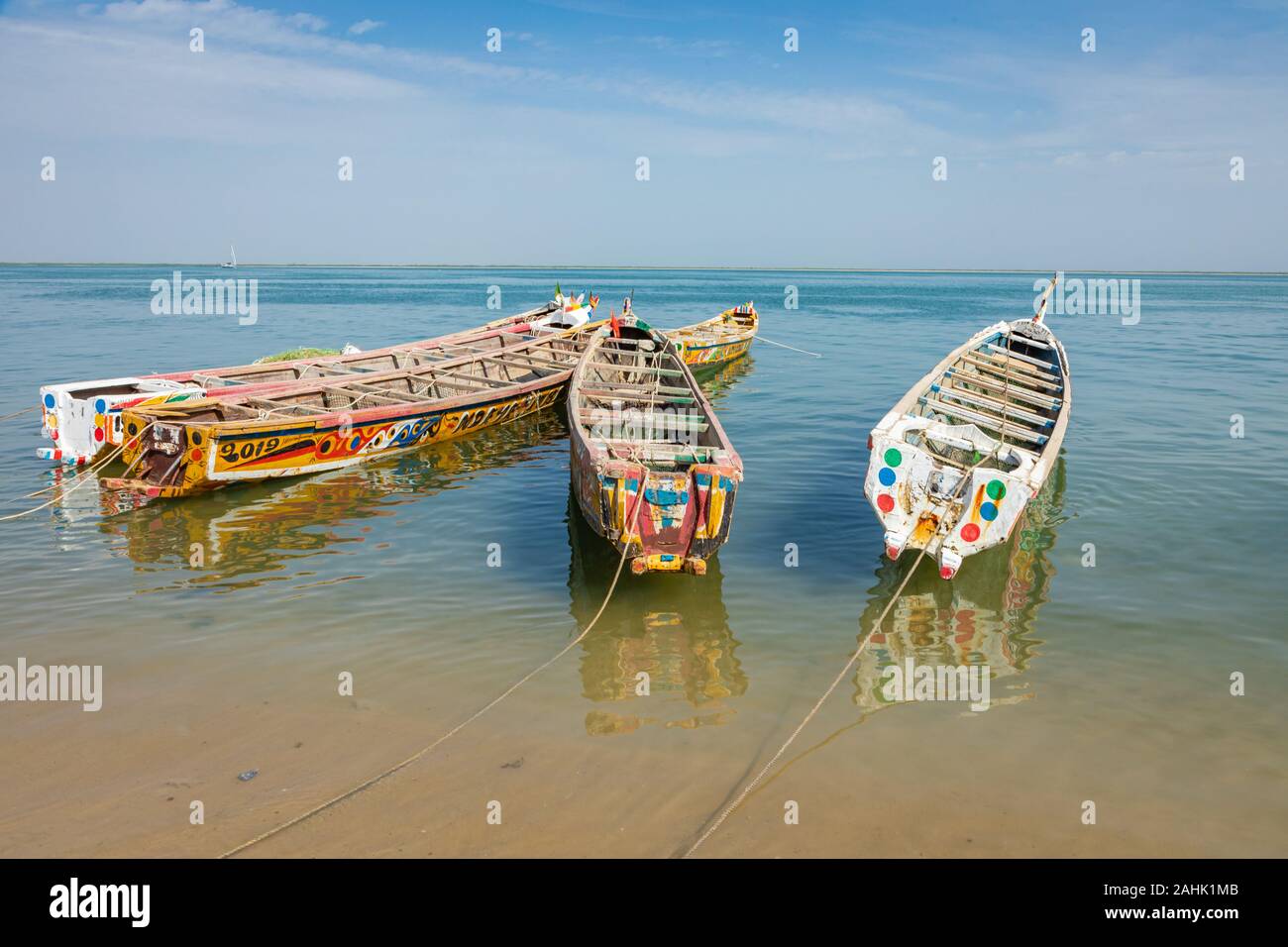 Traditional painted wooden fishing boat in Djiffer, Senegal. West ...
