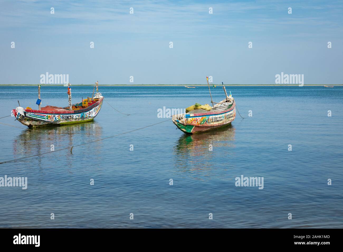 Traditional painted wooden fishing boat in Djiffer, Senegal. West ...