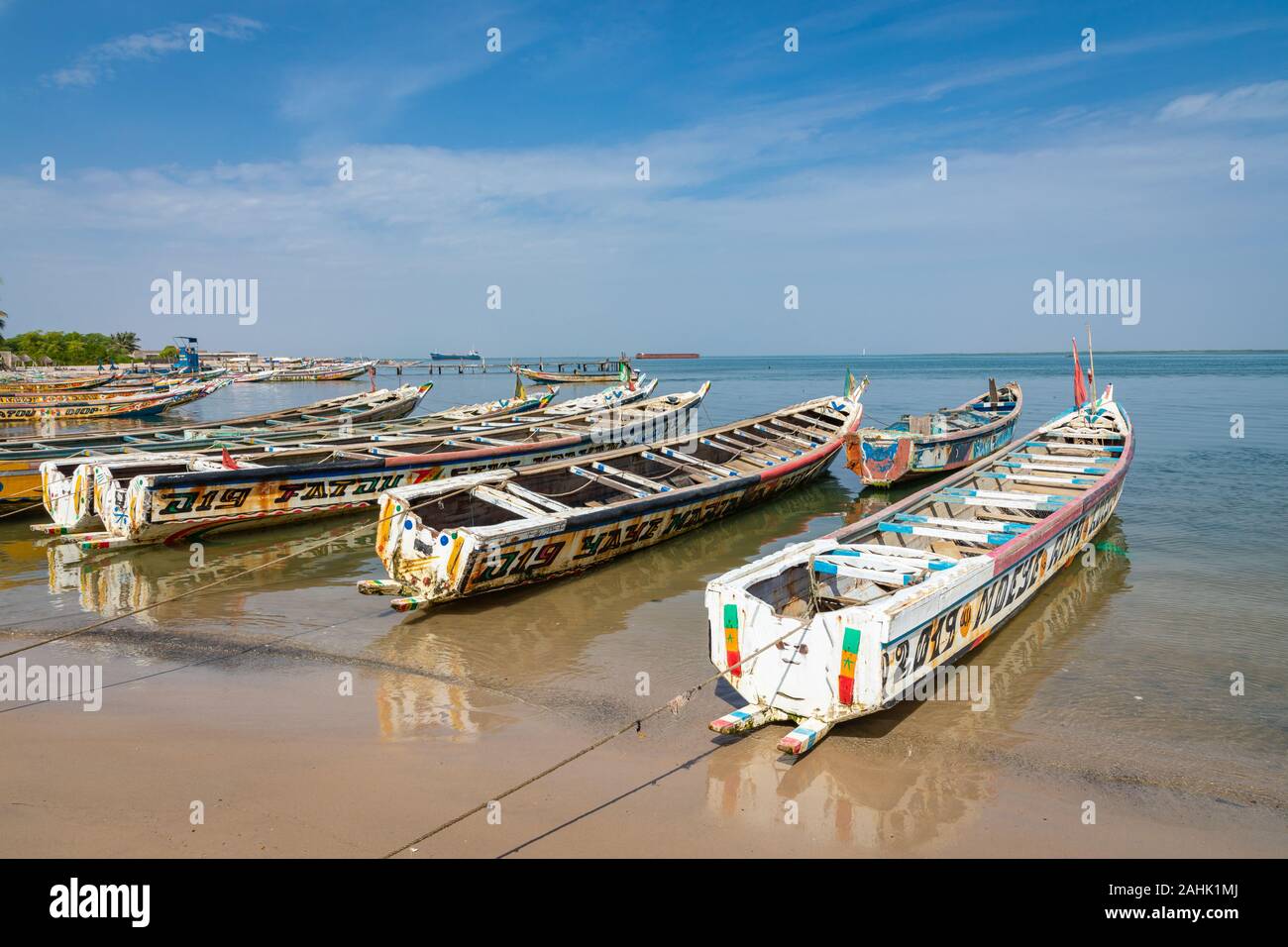 Traditional painted wooden fishing boat in Djiffer, Senegal. West ...