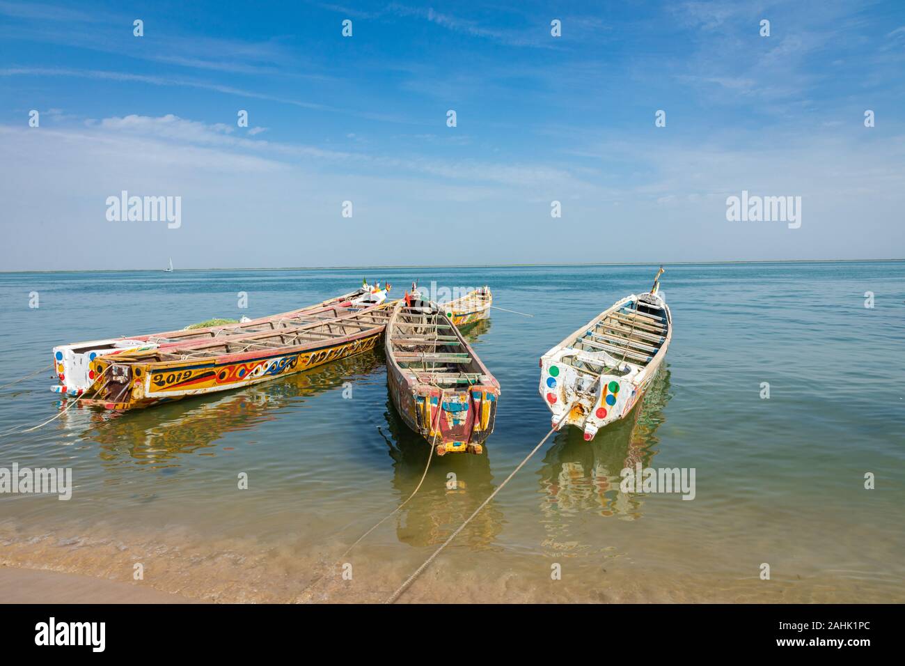 Traditional painted wooden fishing boat in Djiffer, Senegal. West ...