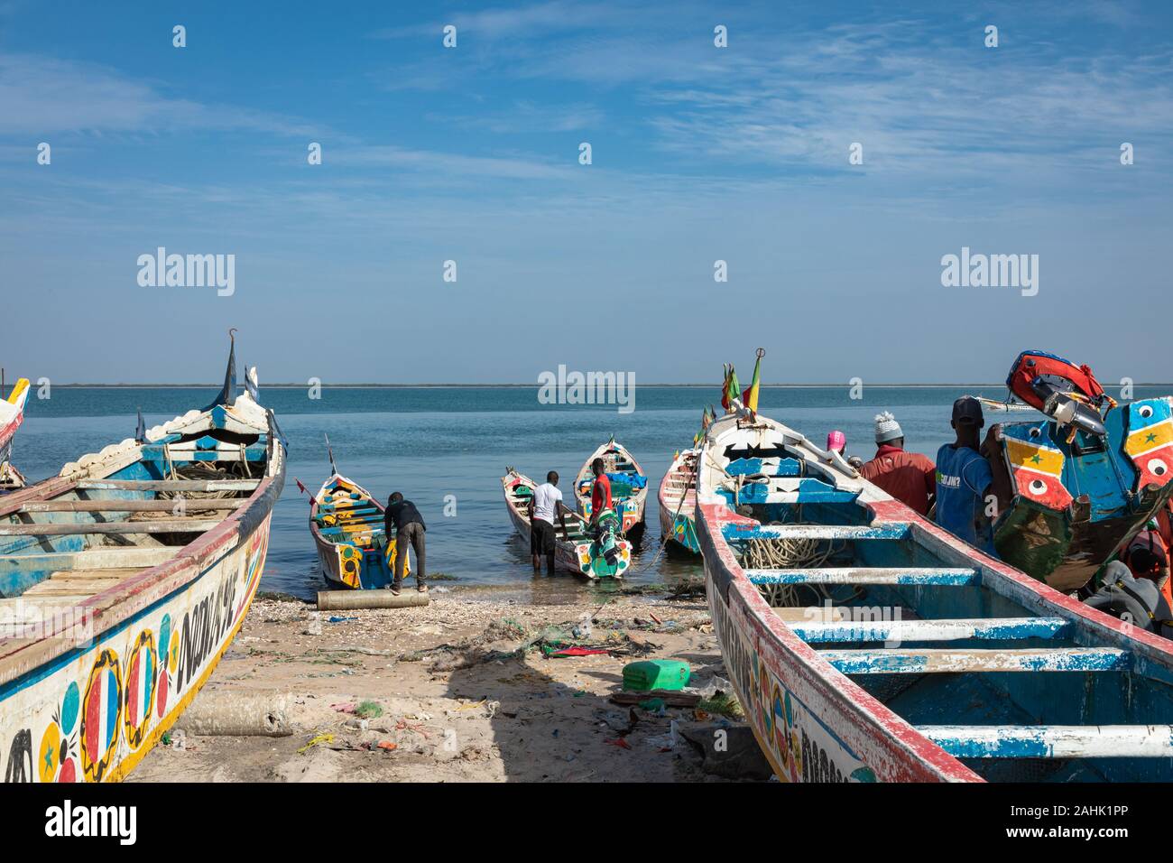 Traditional painted wooden fishing boat in Djiffer, Senegal. West ...