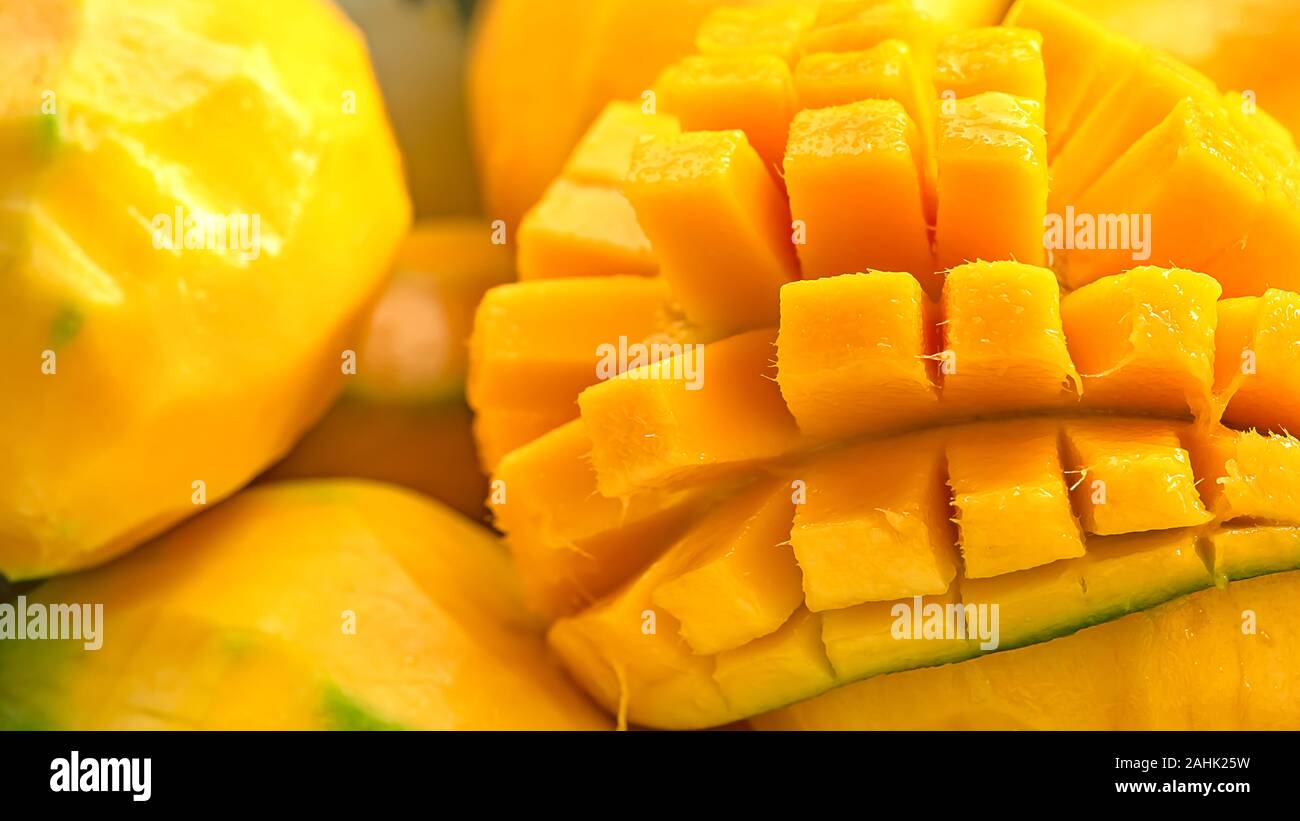 close up Mango fruit and mango cubes macro photography texture ...