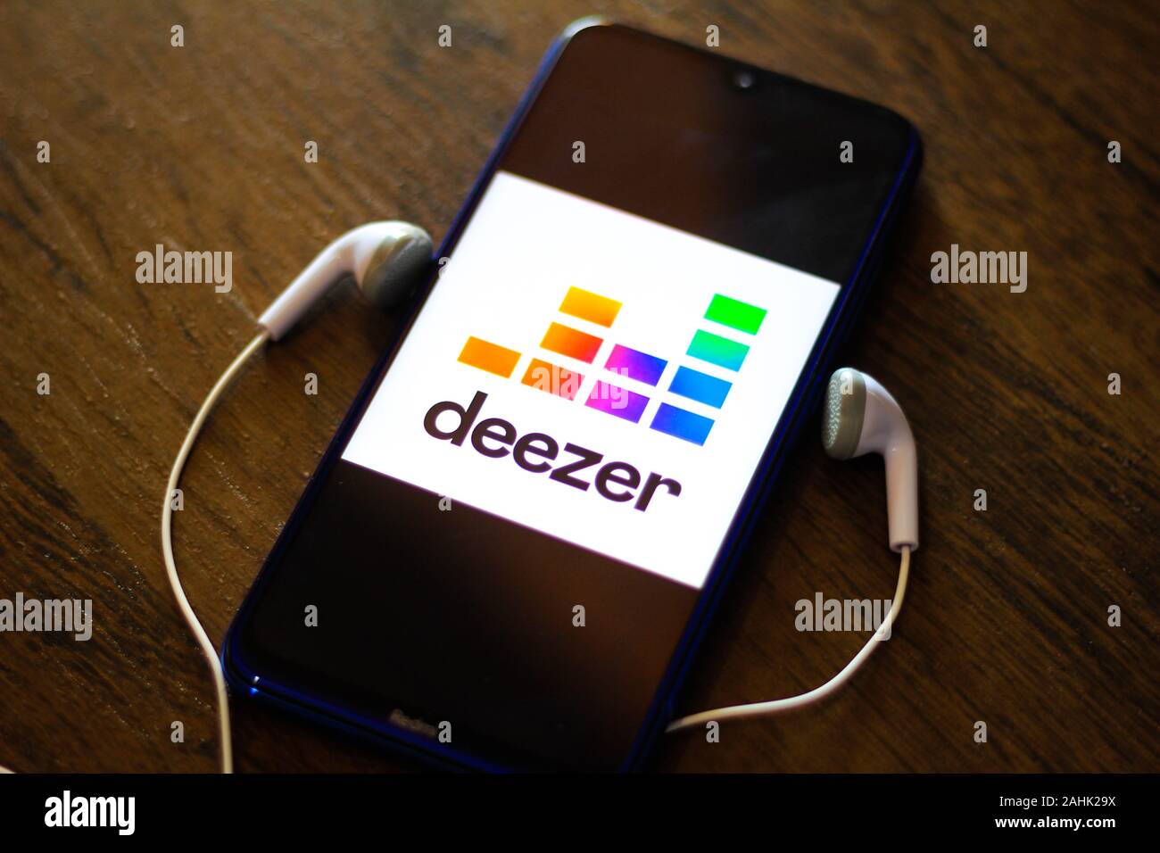 In this photo illustration the Deezer logo is seen displayed on a ...