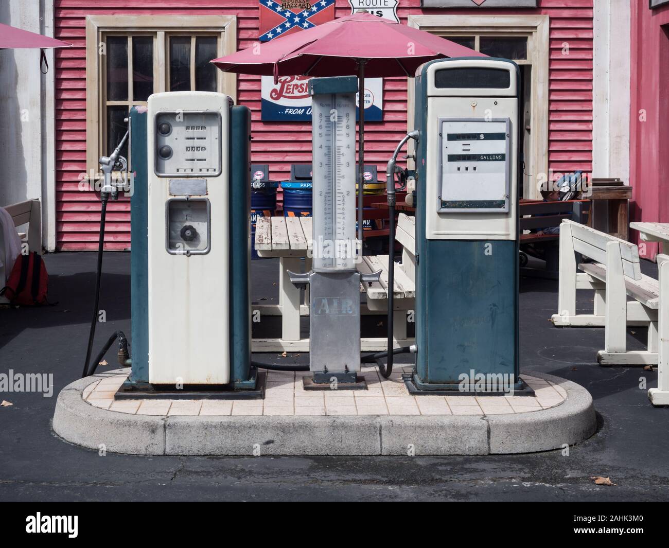 Wooden service station with vintage refueling pumps Stock Photo - Alamy