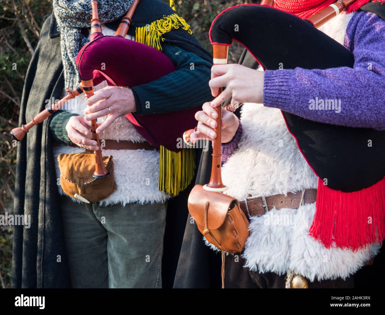 Bagpipe players in gowns during a traditional festival Stock Photo - Alamy