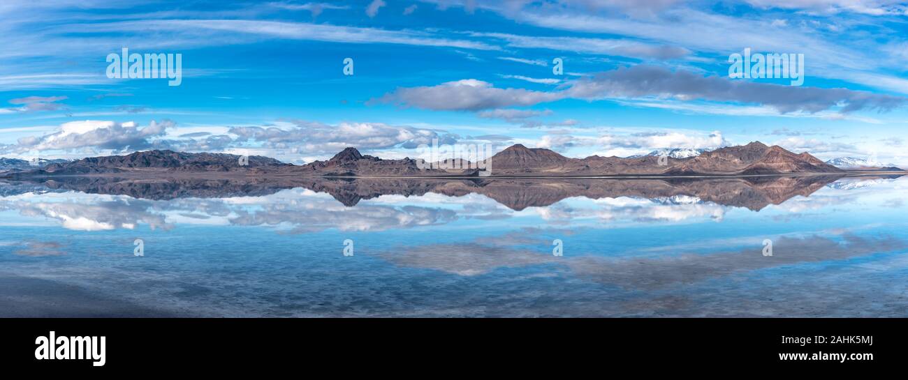 Panorama of mountain reflections on the salt flats in Utah Stock Photo ...