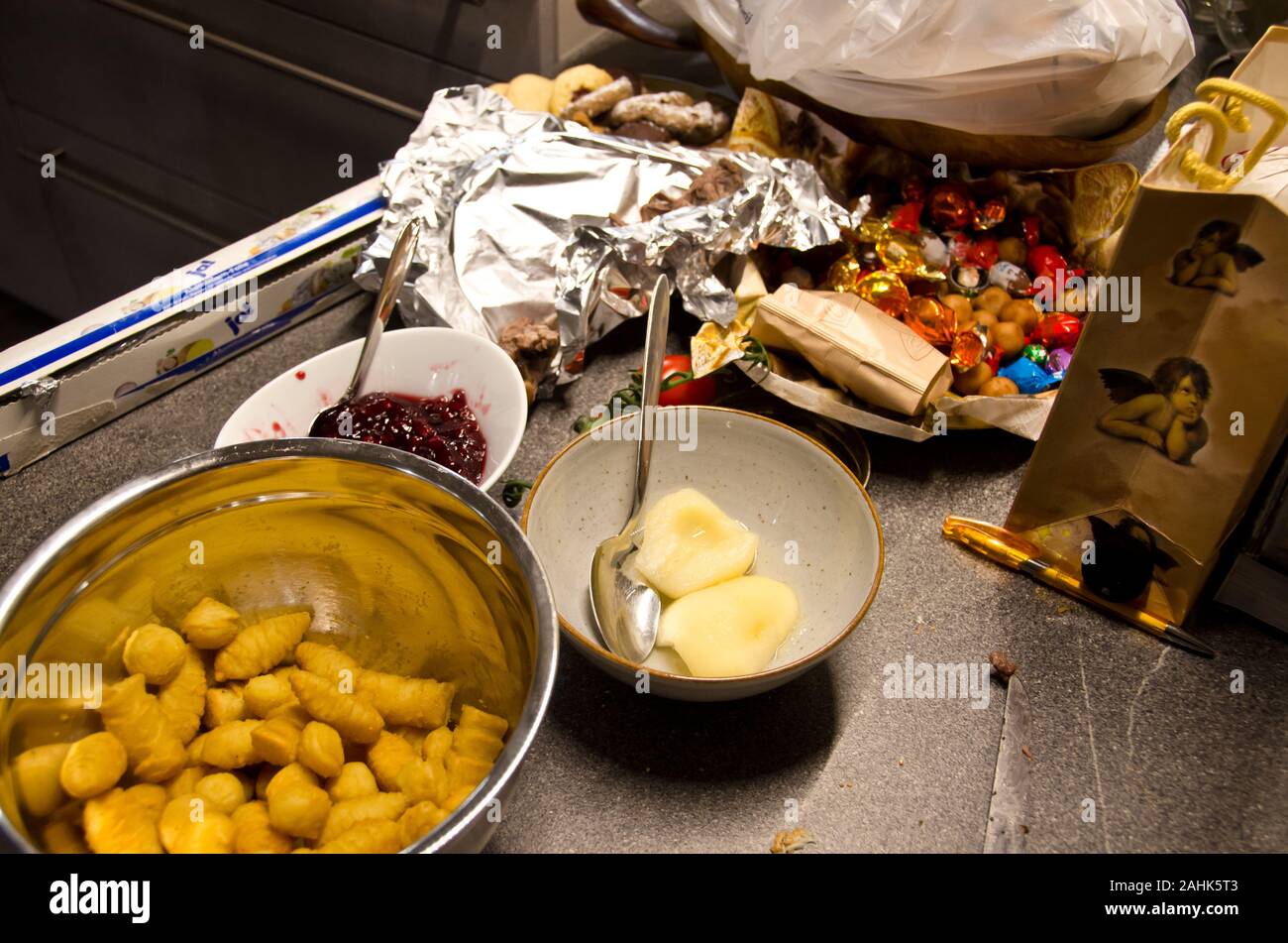 A very dirty kitchen after cooking a meal for a celebrity, with used ...