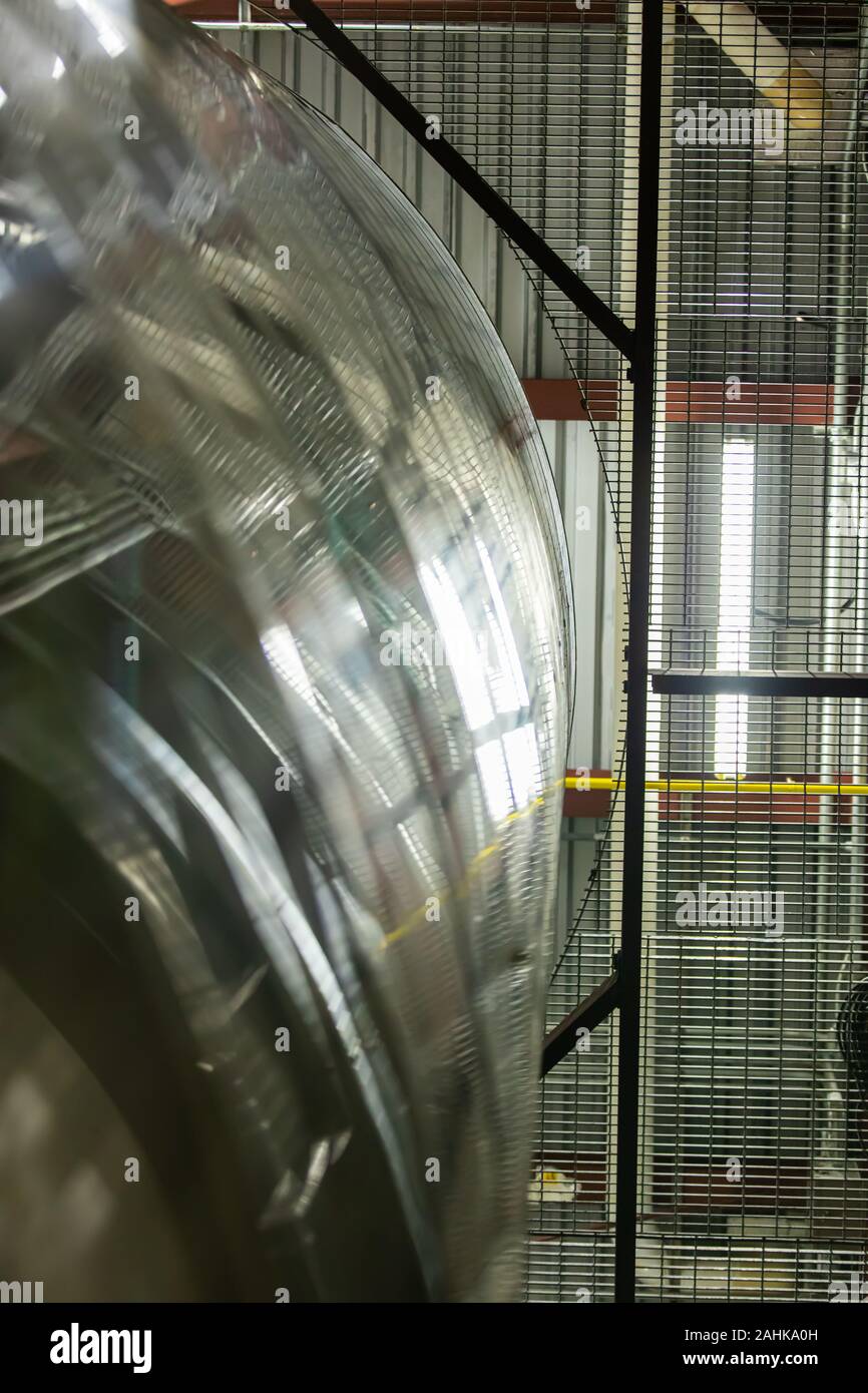 large big stainless steel brewing beer tank or vessel against roof ...