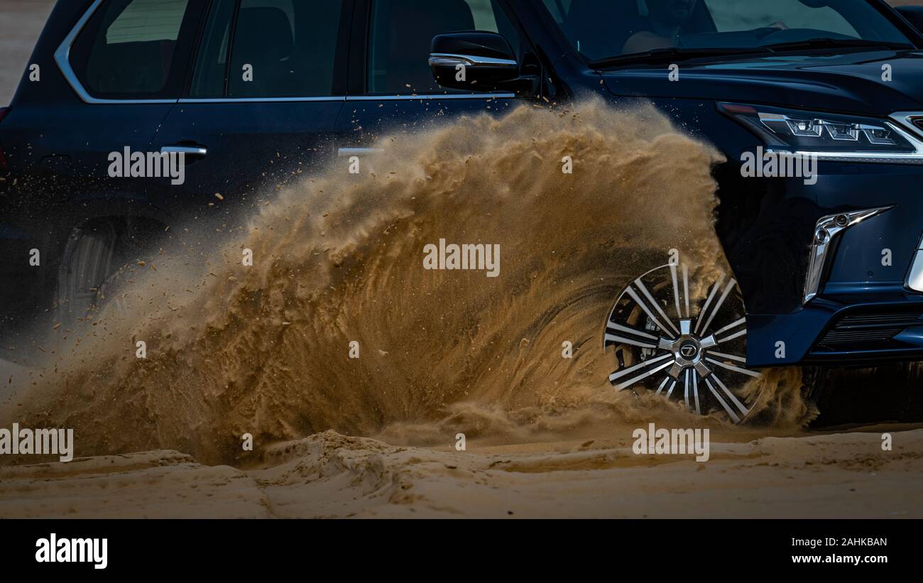 Blue Lexus LX 570 Dune Bashing at Desert Stock Photo - Alamy