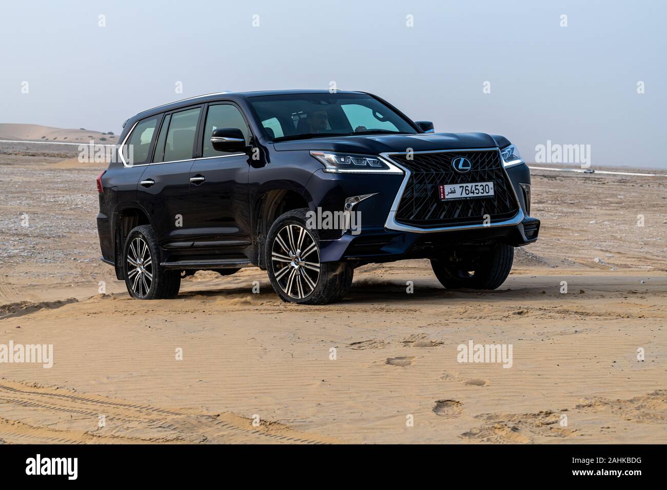 Blue Lexus LX 570 Dune Bashing at Desert Stock Photo - Alamy